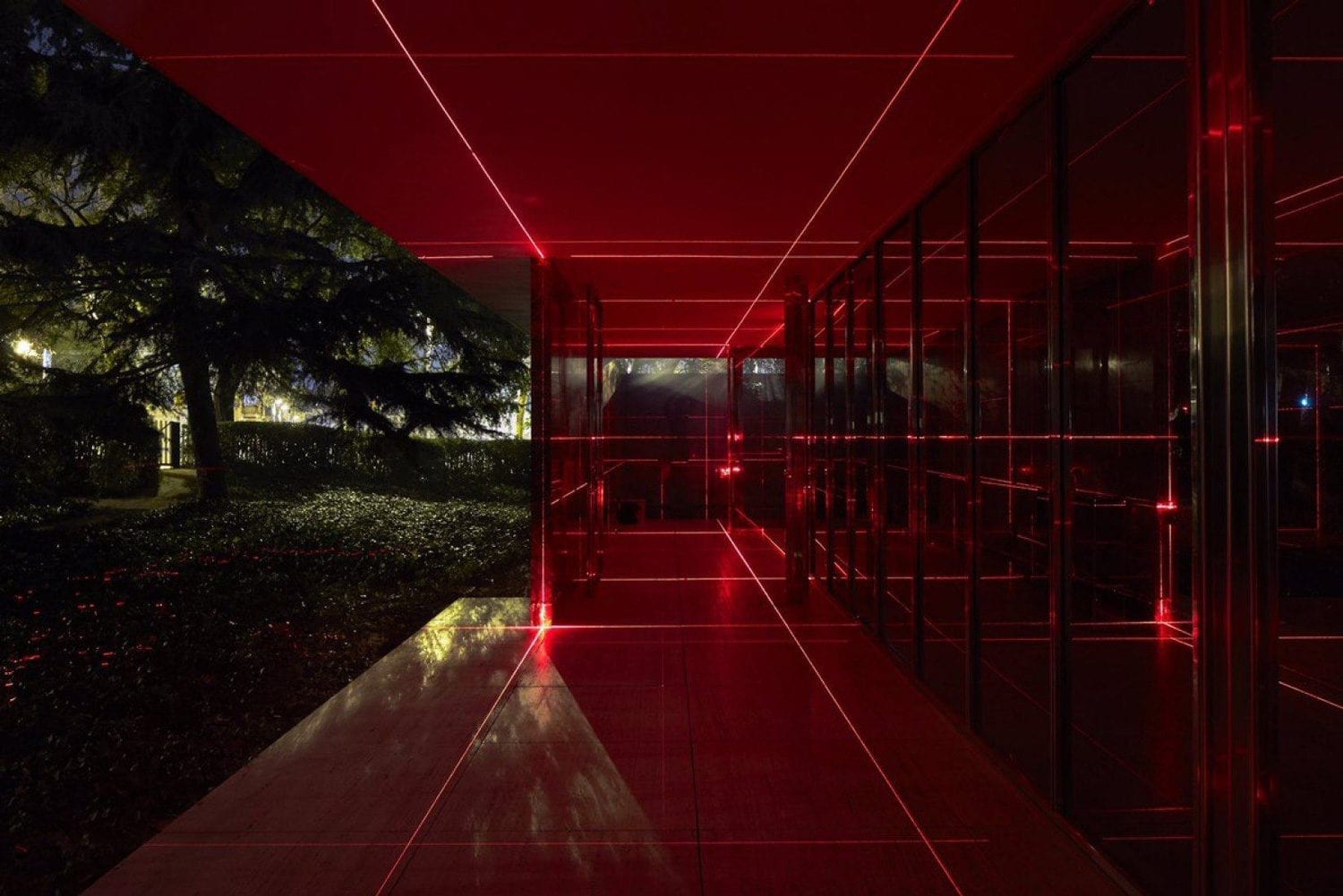 Barcelona Pavilion Lit With a Laser Grid by Luftwerk & Iker Gil ...