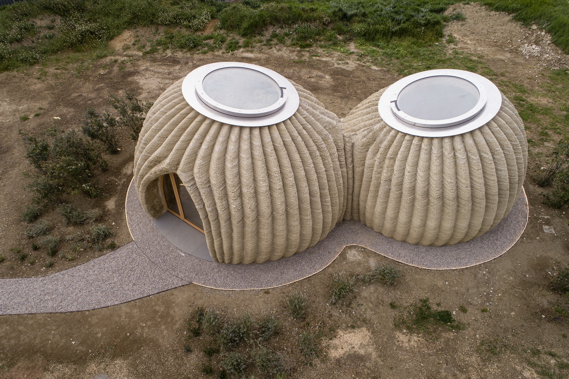 TECLA Completes First 3D Printed House Made of Raw Earth | Yellowtrace