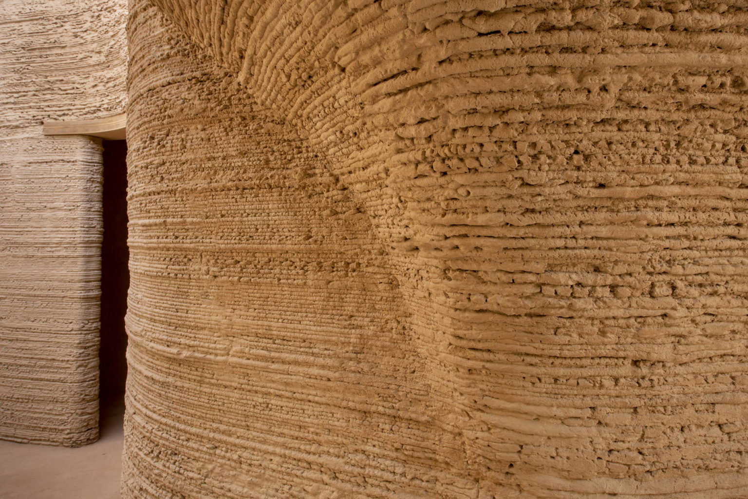 TECLA Completes First 3D Printed House Made of Raw Earth | Yellowtrace