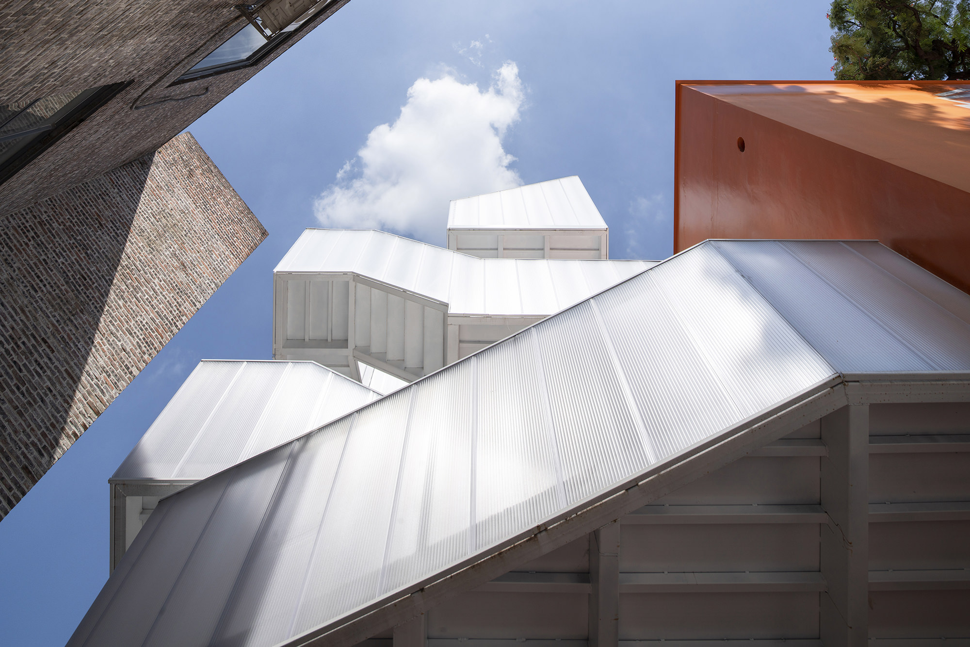 Popped Orange Uhub House by Wutopia Lab | Yellowtrace