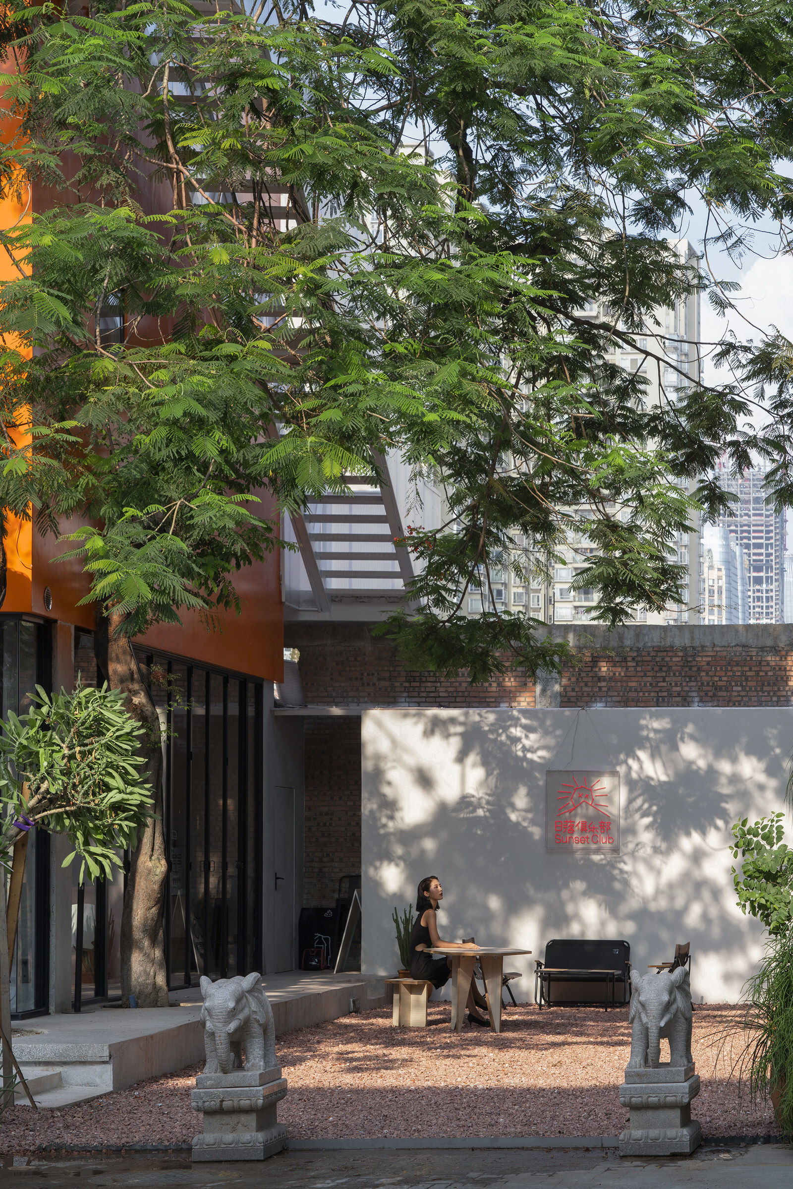 Popped Orange Uhub House by Wutopia Lab | Yellowtrace